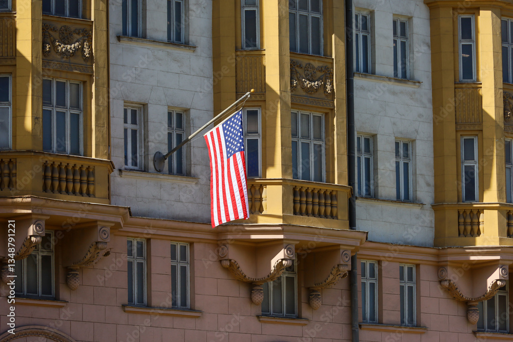 American flag on US embassy facade in Moscow. Symbol of United State of ...