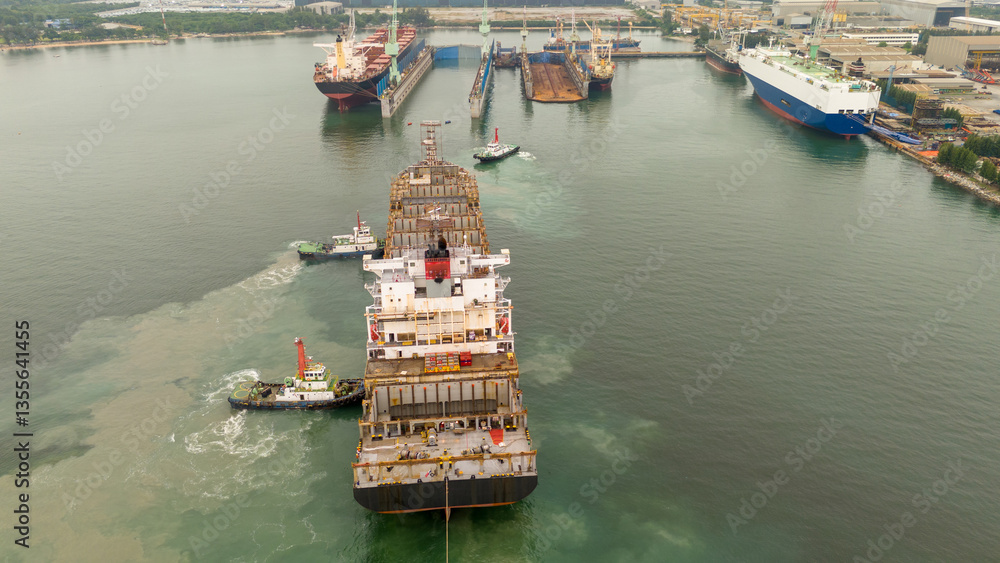 Cargo Ship was pulling by Tugboat go to Maintenance port. cargo ship ...