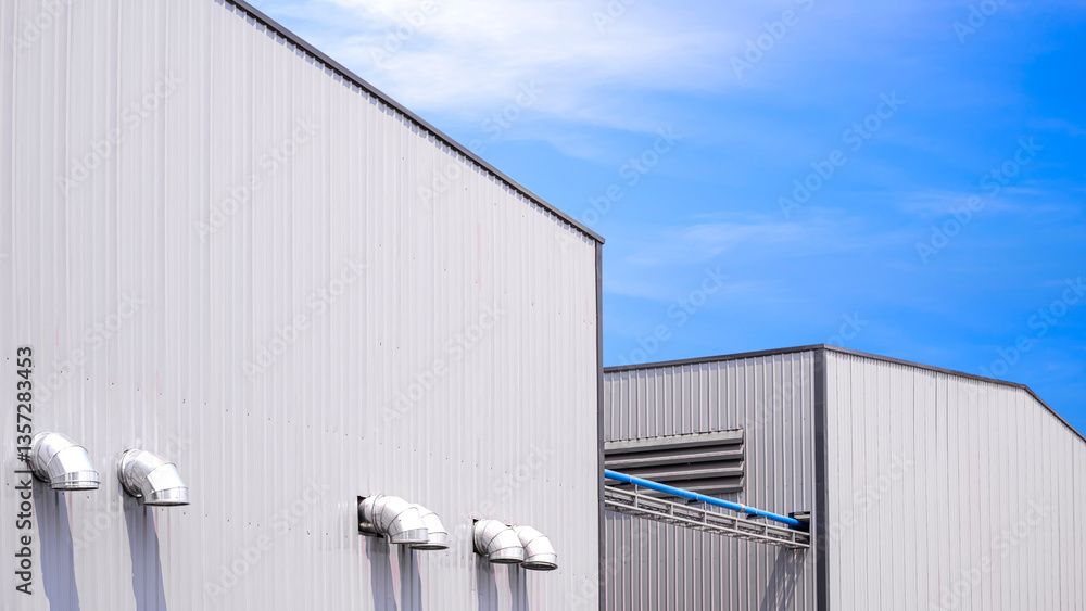 Two white factory industrial production buildings with ventilation duct ...