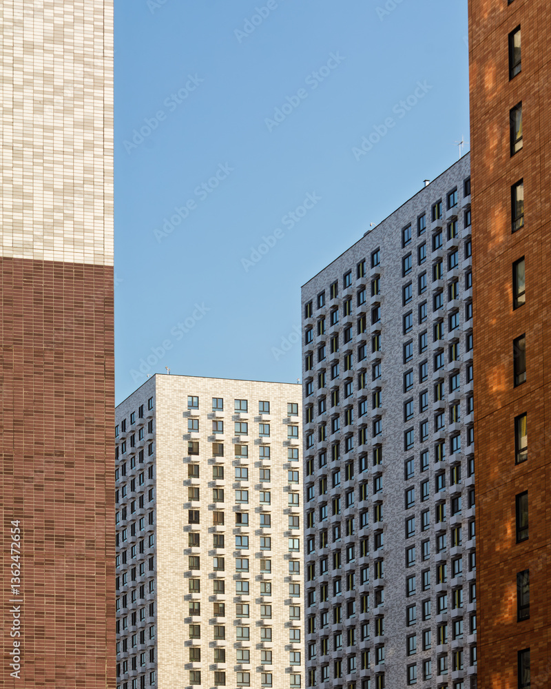 Minimalist high-rise buildings with colorful facades and geometric ...