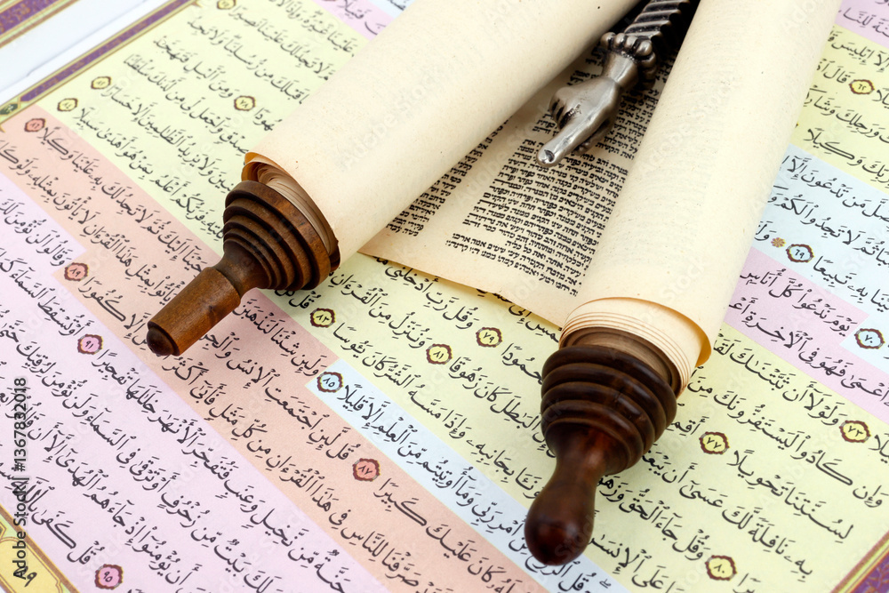Torah scrolls in Hebrew, Yad and Quran in Arabic, relationship between ...
