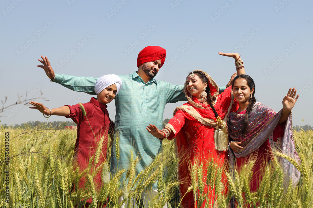 Punjabi sikh family celebrating Baisakhi or vaisakhi festival in ...