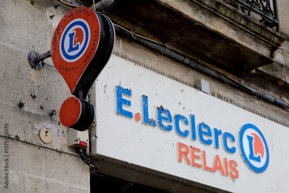 E.leclerc relais text brand and logo sign chain on building facade shop ...