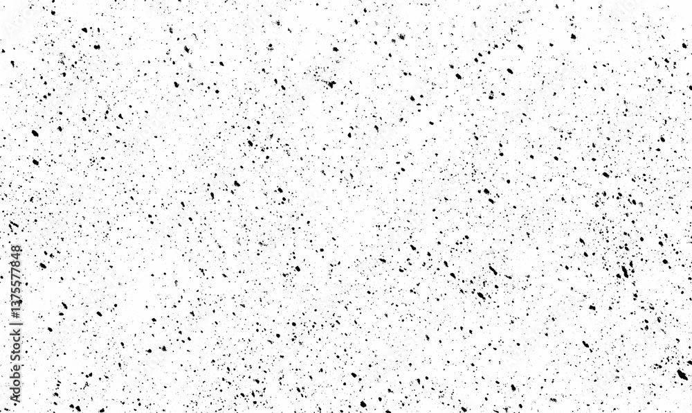 This image features a scattered pattern of black specks over a stark ...