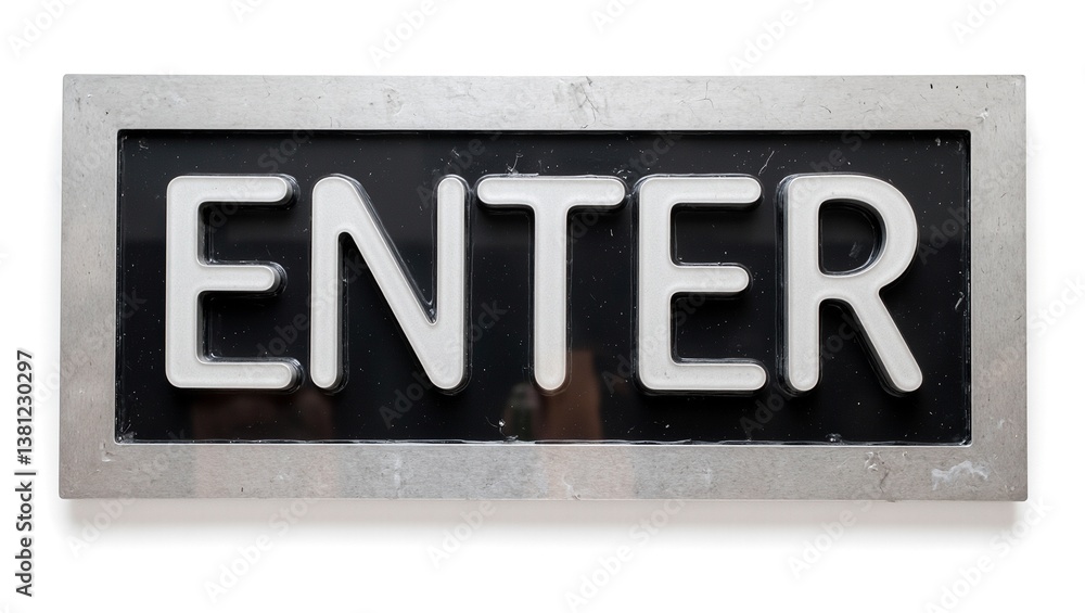 Modern ENTER sign in silver on black panel above glass door in shopping ...