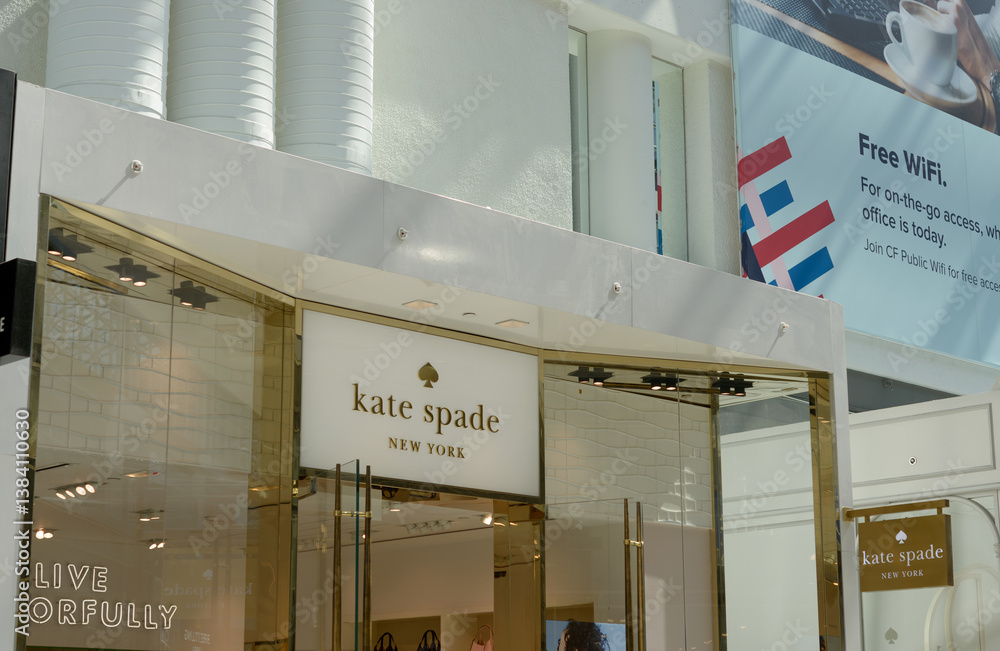sign and entrance to Kate Spade at CF Toronto Eaton Centre, a major ...