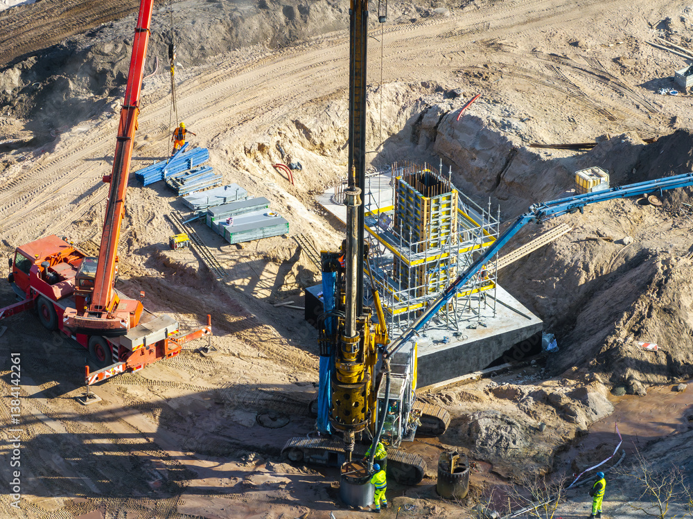 Active construction site in Riga, Latvia, featuring a red crane ...