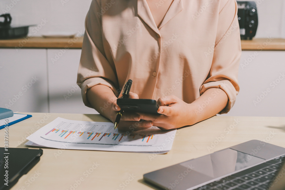 Tax deduction planning concept. Women use a calculator to calculate ...