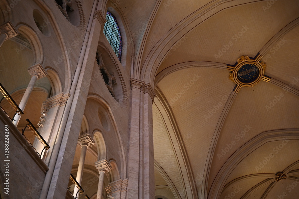 Interior of a Gothic cathedral with high arched vaults. Stone columns ...