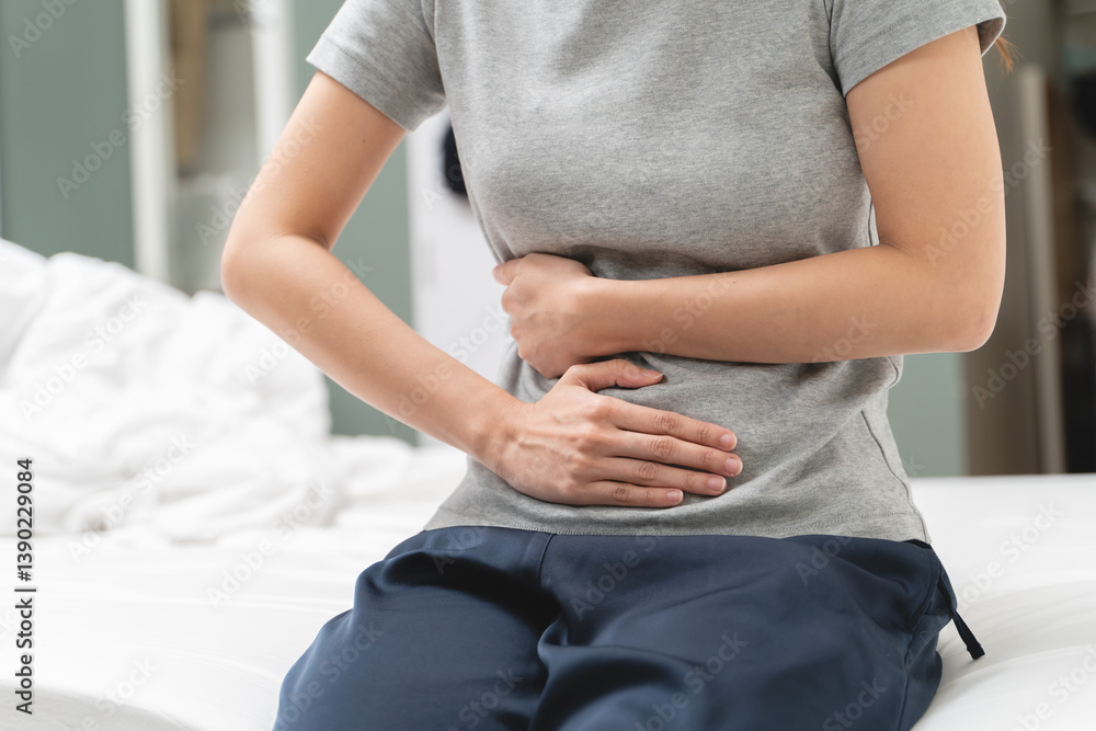 Menstruation symptom concept, Close-up woman touching her belly and ...