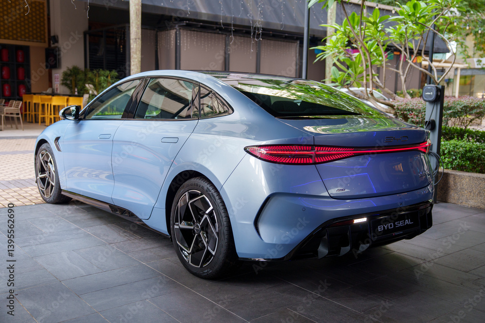 Penang, Malaysia – Mar 26, 2025: Rear view of a sleek light blue BYD ...