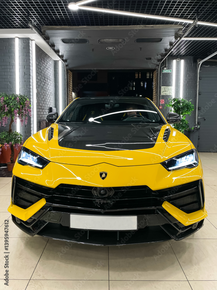 Yellow color Urus Performante in the showroom. Exterior of the ...