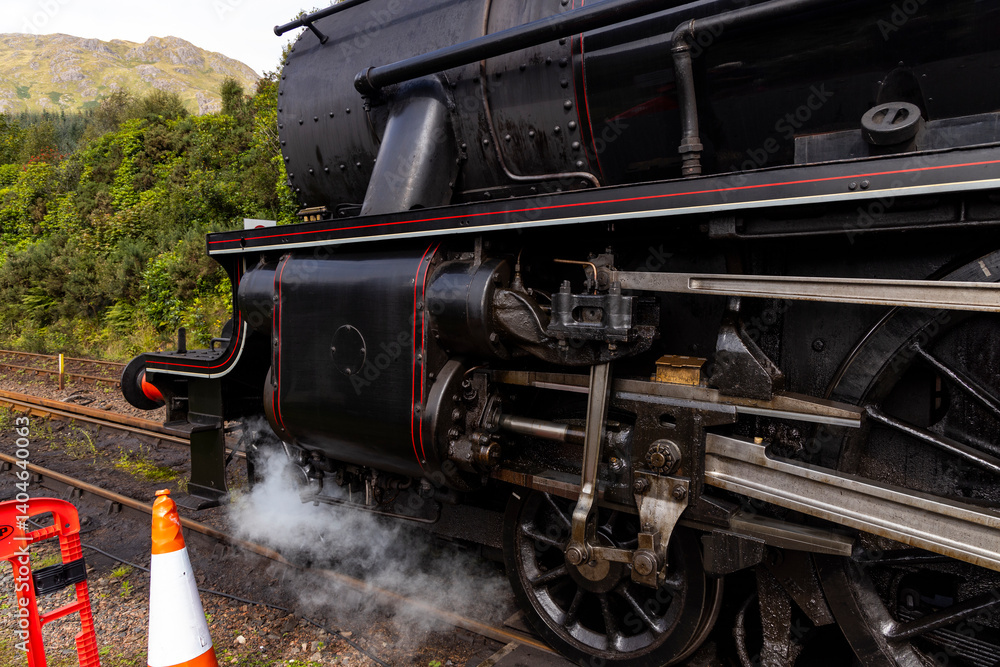 Iconic Jacobite steam train crosses Glenfinnan Viaduct and stops at the ...