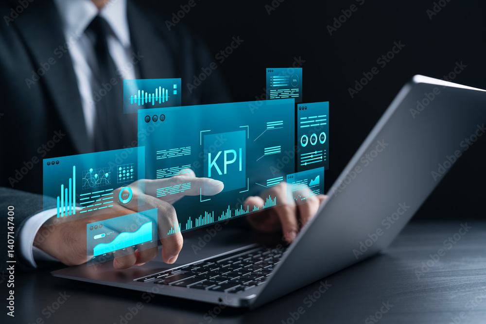 Fotografie Key Performance Indicators KPI Dashboard, Businessman using laptop dashboard graph ...