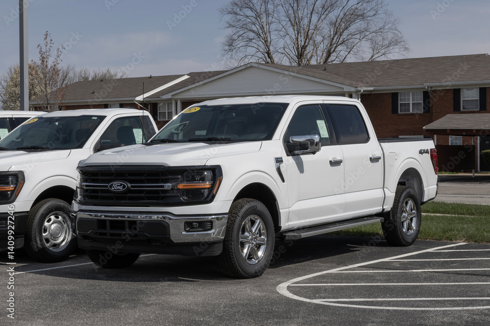 Ford F-150 4X4 Supercrew pickup display at a dealership. Ford offers ...