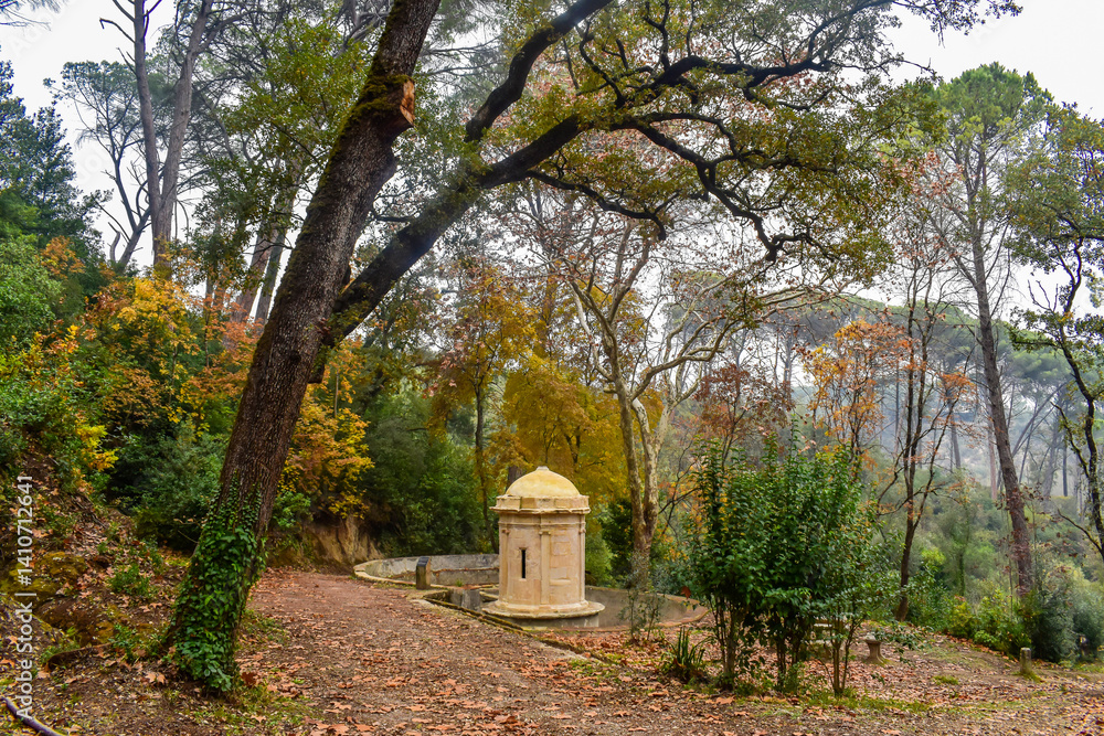 Mini 16th century temple called Charolinha with a lake around it and ...