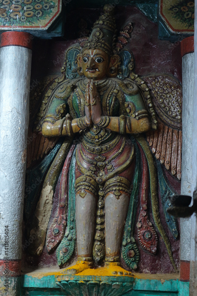 Garuda, the bird-man servant of Lord Vishnu, on the wall of a Hindu ...