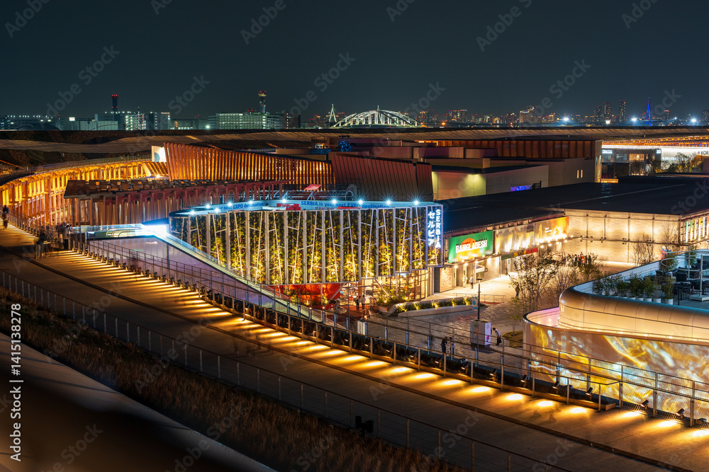Osaka, Japan - April 16 2025 : Night view of the illuminated Grand Ring ...