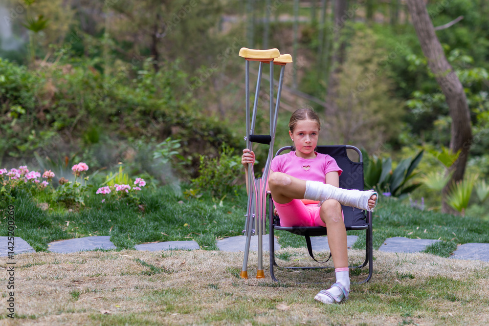 Little caucasian girl walking outdoor with plaster bandage on foot ...