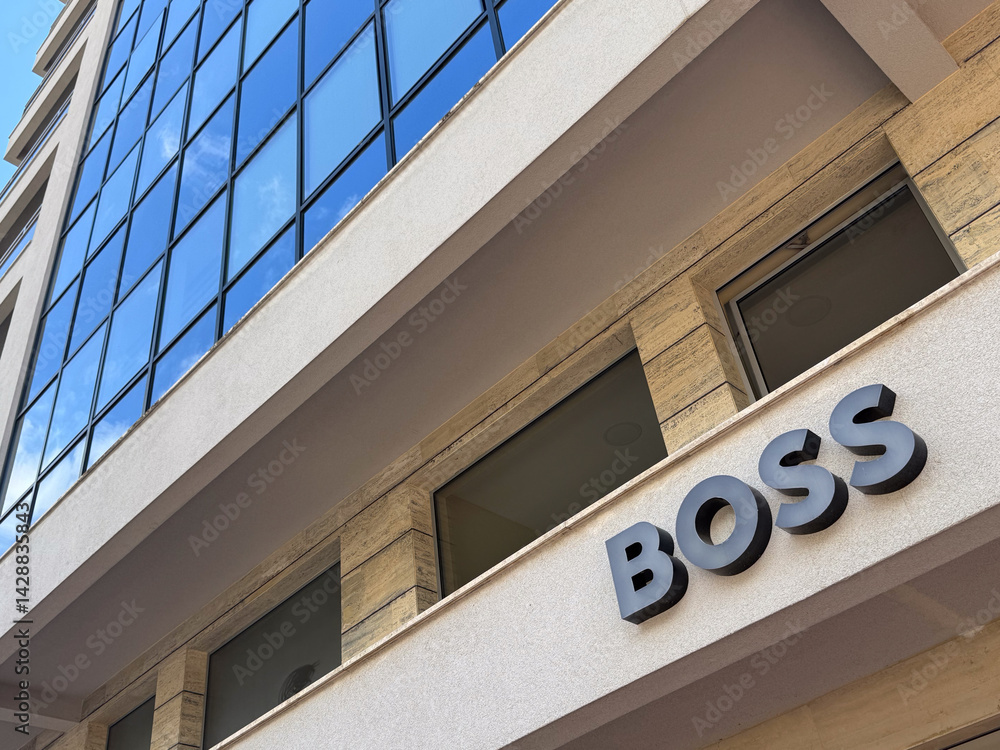 Budva, Montenegro - April 18, 2025: BOSS logo on the canopy of the ...