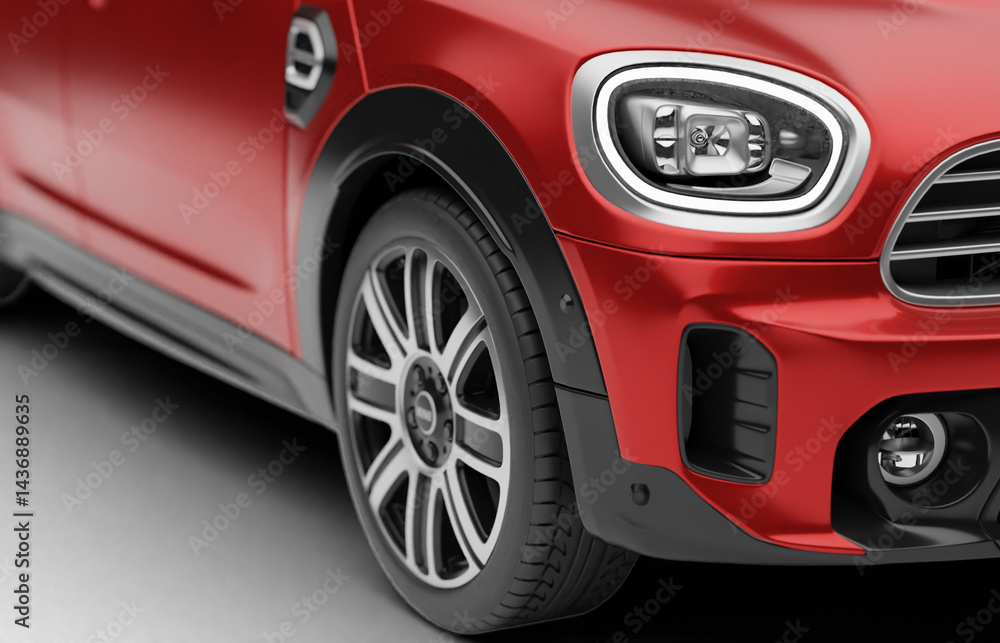 Detailed close-up of the front headlight of the red Mini Cooper ...
