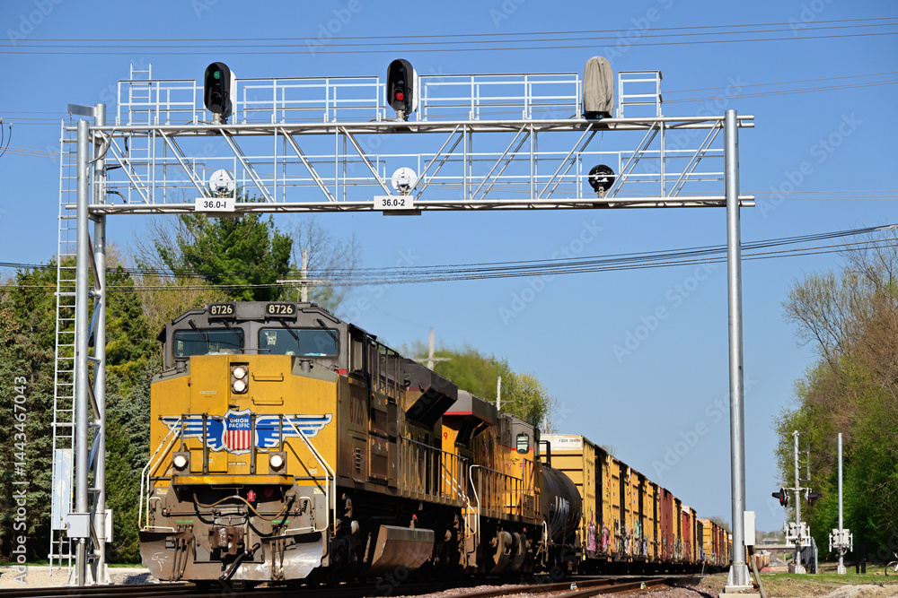 Two Union Pacific locomotives lead a merchandise freight train ...