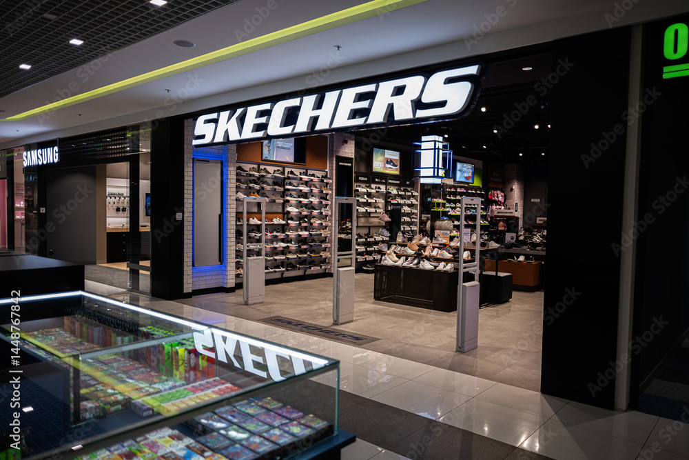Skechers shoe store display in modern shopping mall environment Stock ...