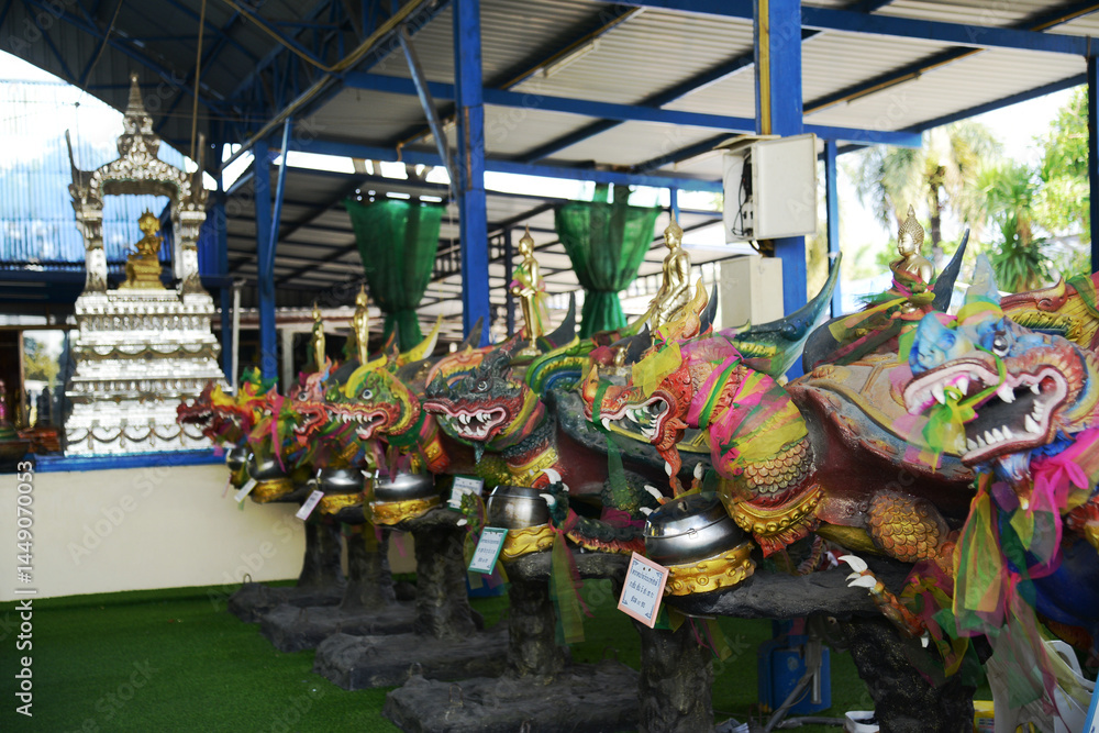 Turtle statues are lined up for people to worship at Nong Jab Tao ...