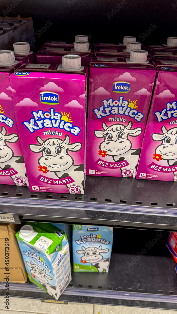 Cartons of Moja Kravica skim milk, whimsical bovine design, dairy day ...