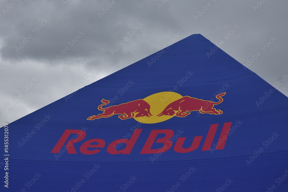 The iconic Red Bull logo represents a global brand known for energy ...