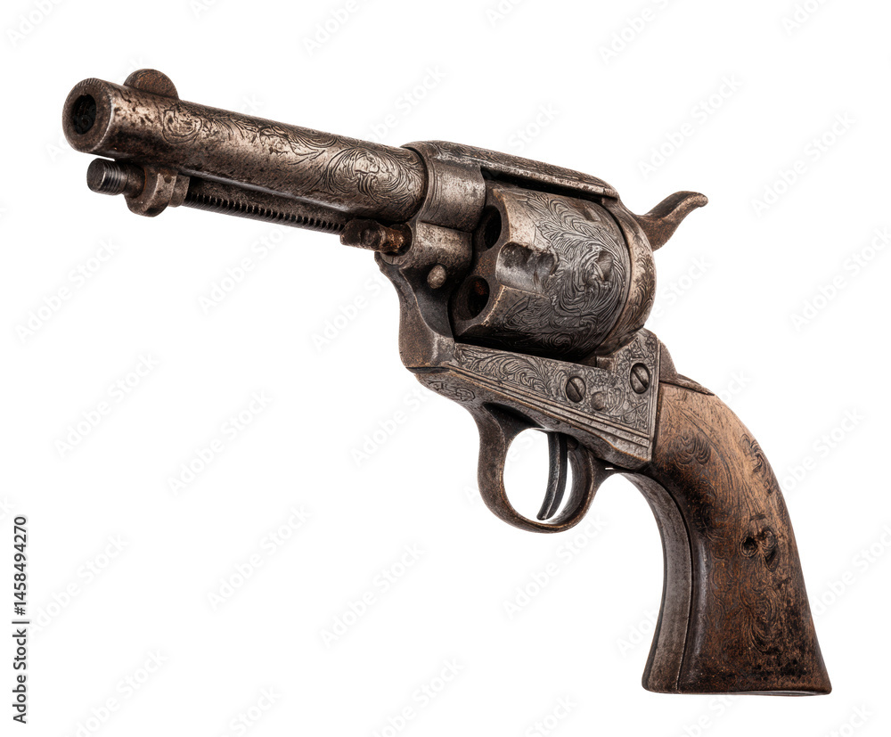 Vintage revolver with intricate engravings and worn patina on a ...