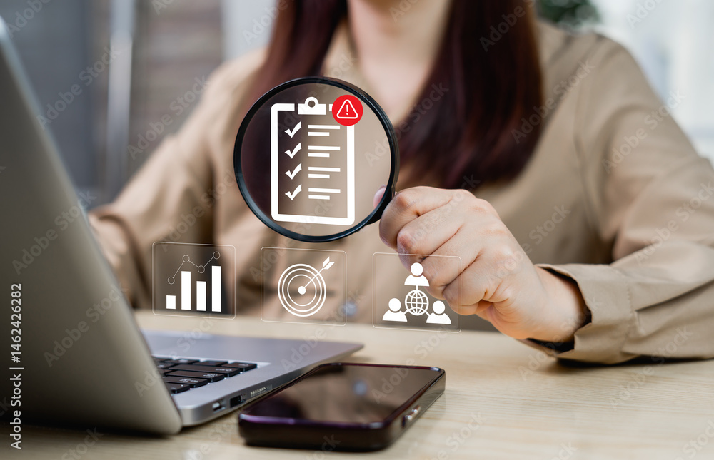 Businesswomen managing and assessing risks for business investment ...