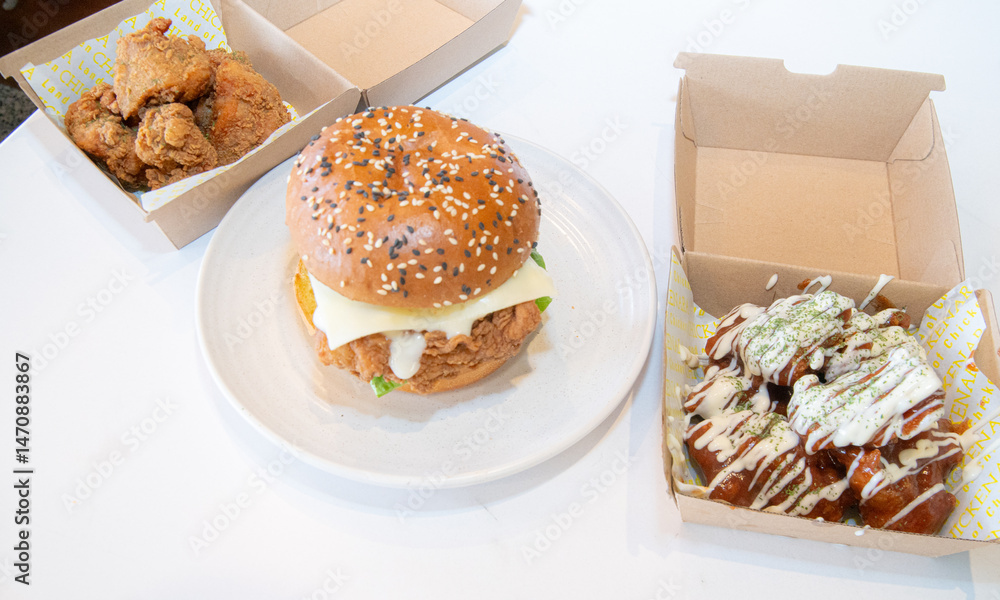 Deep-fried boneless Korean chicken burger with sweet buns. Crispy ...