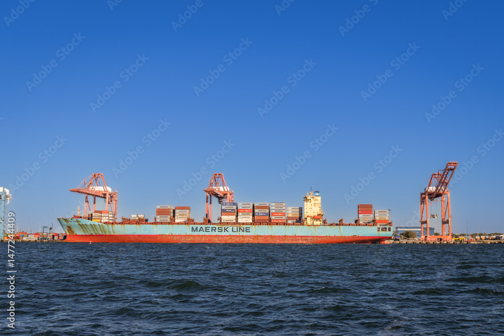 Norfolk, VA, US-May 1, 2025: Large international cargo ships in harbor ...