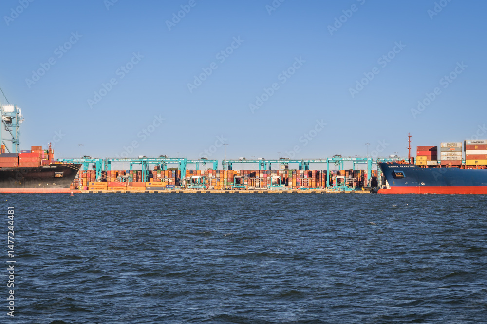 Norfolk, VA, US-May 1, 2025: Large international cargo ships in harbor ...
