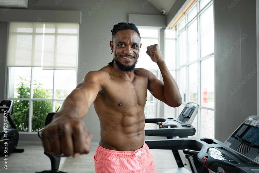 Portrait Shirtless muscular black African man at fitness gym Stock ...