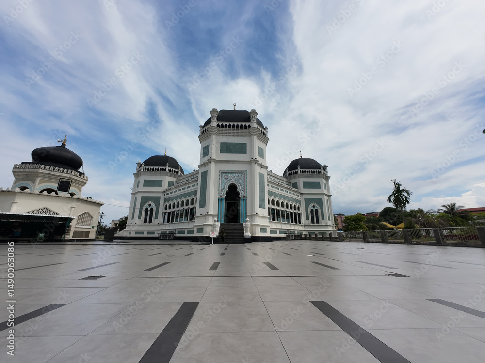 Front view of Al-Mashun Grand Mosque in Medan, Indonesia, with a wide ...