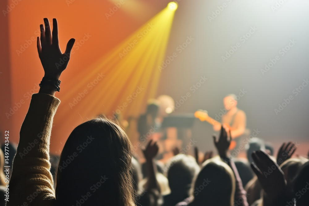 Musical performance on a talk show stage, with the host introducing the ...