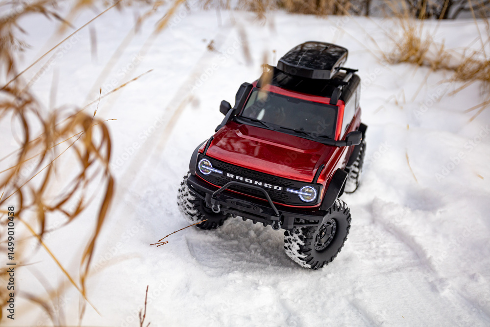 red car in snow Ford Bronko New RC model Crawler Scale 1/10 Stock Photo ...