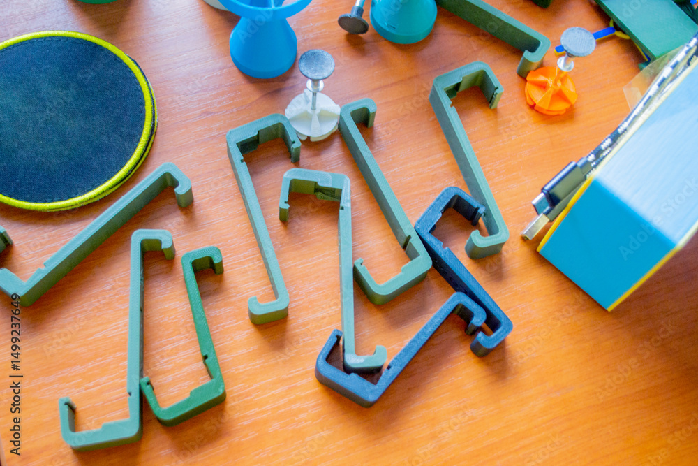 Objects printed on 3D printer from melted plastic close-up. Model ...