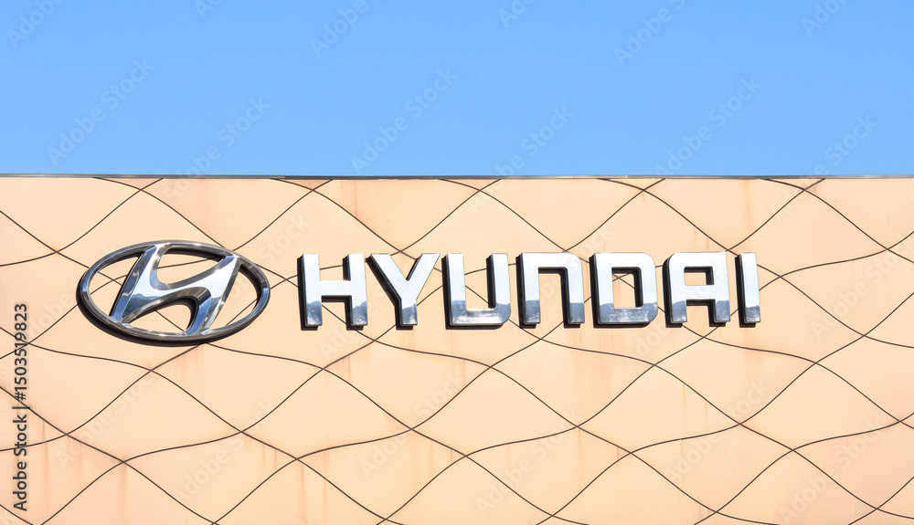 Sign on the facade of a Hundai car dealership Stock Photo | Adobe Stock