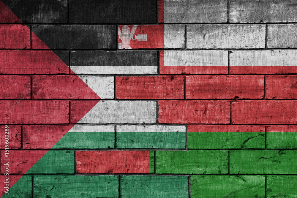 colourful painted big national flag of palestine and flag of oman on a ...