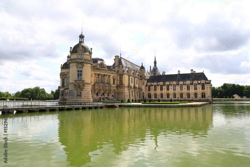 Chantilly, France - June 2, 2025. The Castle of Chantilly is a historic ...