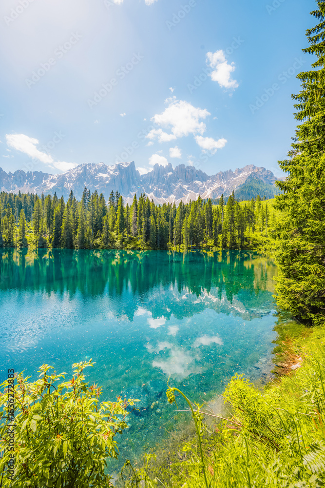 Karersee mountain lake in the Dolomites landscape, South Tyrol alps ...