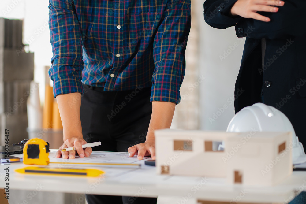 civil engineer or architect business useing calculator about calculate ...
