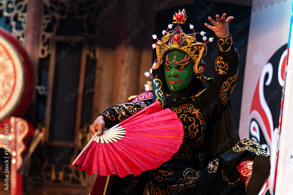 Chinese actor performs a public traditional changing face performance ...