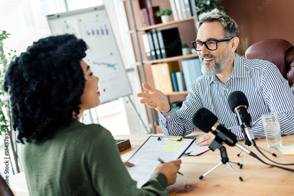 Business meeting with a diverse team in an office setting fostering ...
