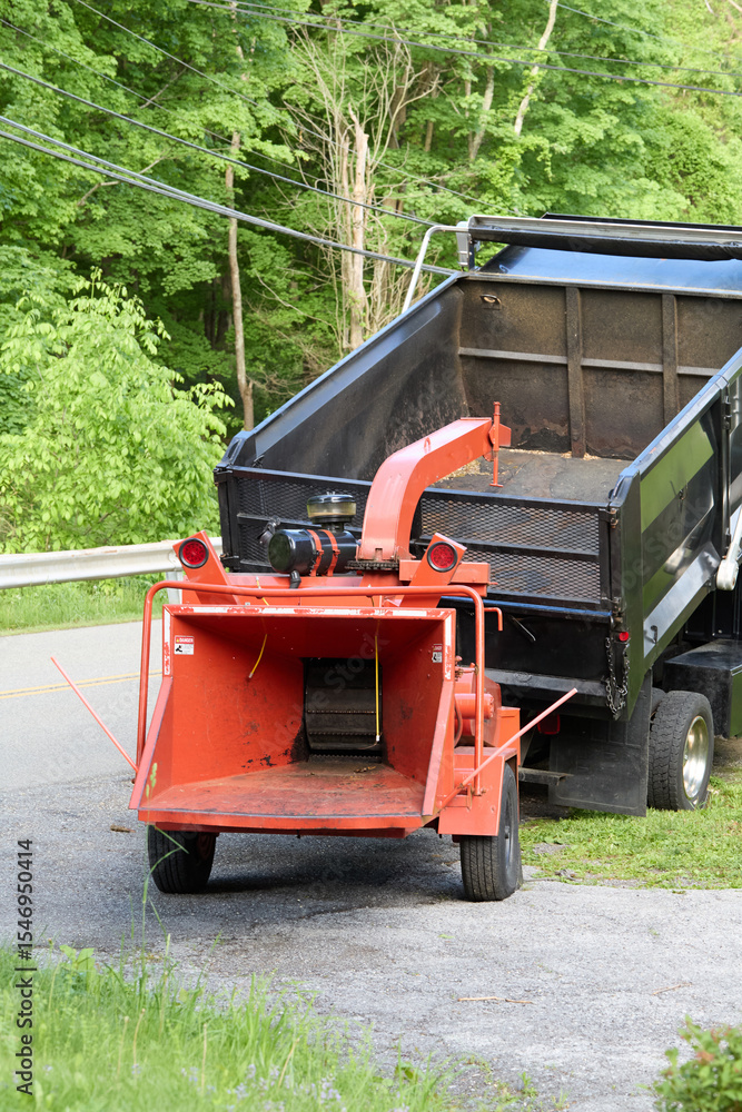 Tree Removal Crew with Wood Chipper and Utility Trailer in Forested ...