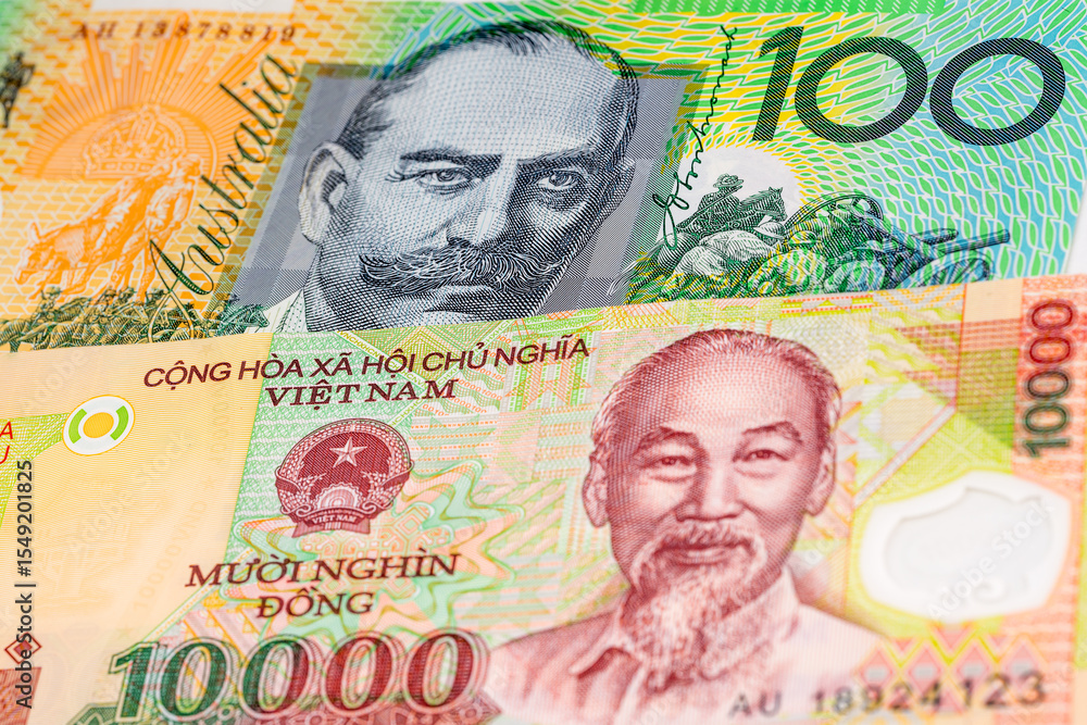100 Australian dollar and 10000 Vietnamese dong banknotes ...