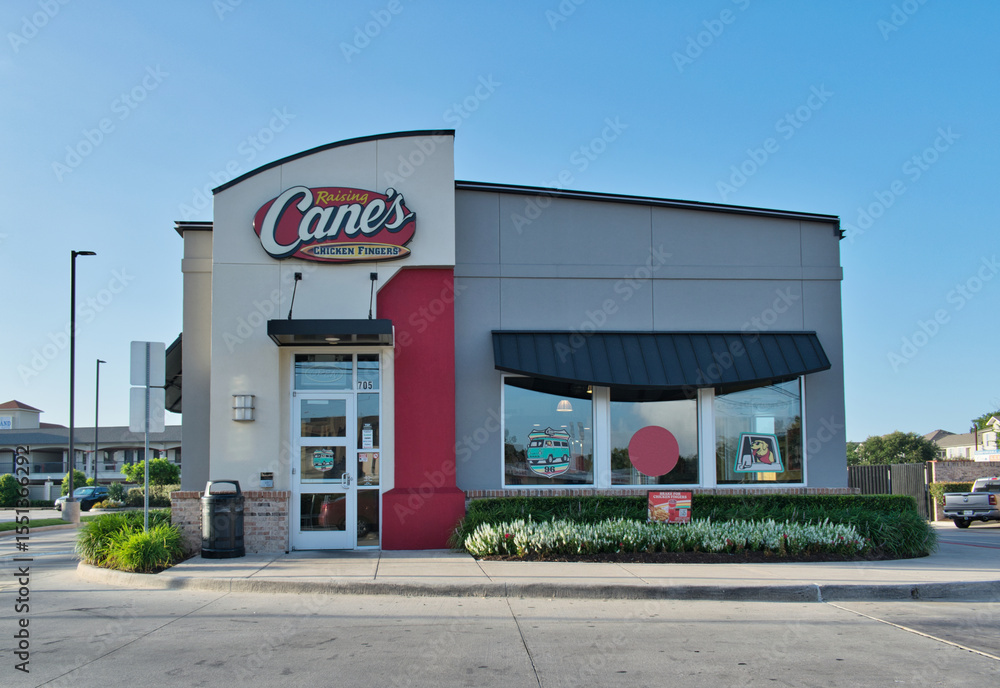 Raising Canes Chicken Fingers fast food restaurant location storefront ...